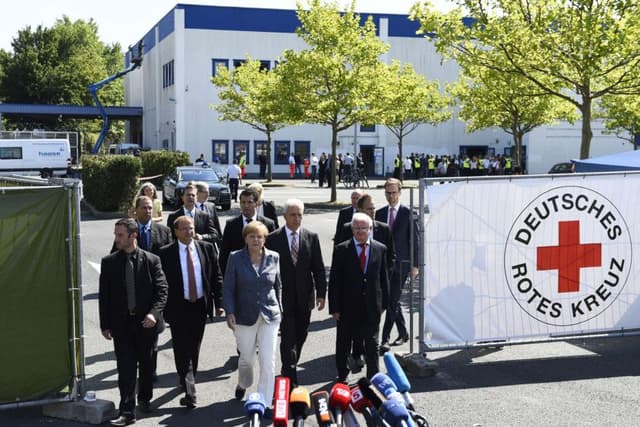 Germany Angela Merkel Visits Asylum Seeker Homes
